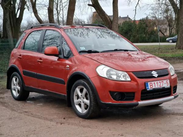 Orange Suzuki SX4 2009 in Grobiņa, with an engine capacity of 1.90 L and mileage of 341 thousand km for 2450 €, photo 5 on AUTOMOTO.COM.LV