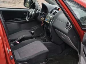 Orange Suzuki SX4 2009 in Grobiņa, with an engine capacity of 1.90 L and mileage of 341 thousand km for 2450 €, photo 8 on AUTOMOTO.COM.LV