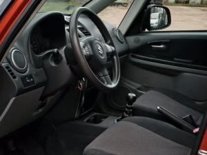 Orange Suzuki SX4 2009 in Grobiņa, with an engine capacity of 1.90 L and mileage of 341 thousand km for 2450 €, photo 10 on AUTOMOTO.COM.LV