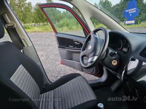 Oranžs Suzuki SX4 2011 Tallina, ar dzinēja tilpumu 1.60 L un nobraukumu 50 tūkst. km par 8500 €, foto 10 vietnē AUTOMOTO.COM.LV