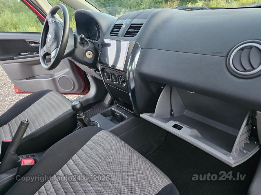 Oranžs Suzuki SX4 2011 Tallina, ar dzinēja tilpumu 1.60 L un nobraukumu 50 tūkst. km par 8500 €, foto 15 vietnē AUTOMOTO.COM.LV