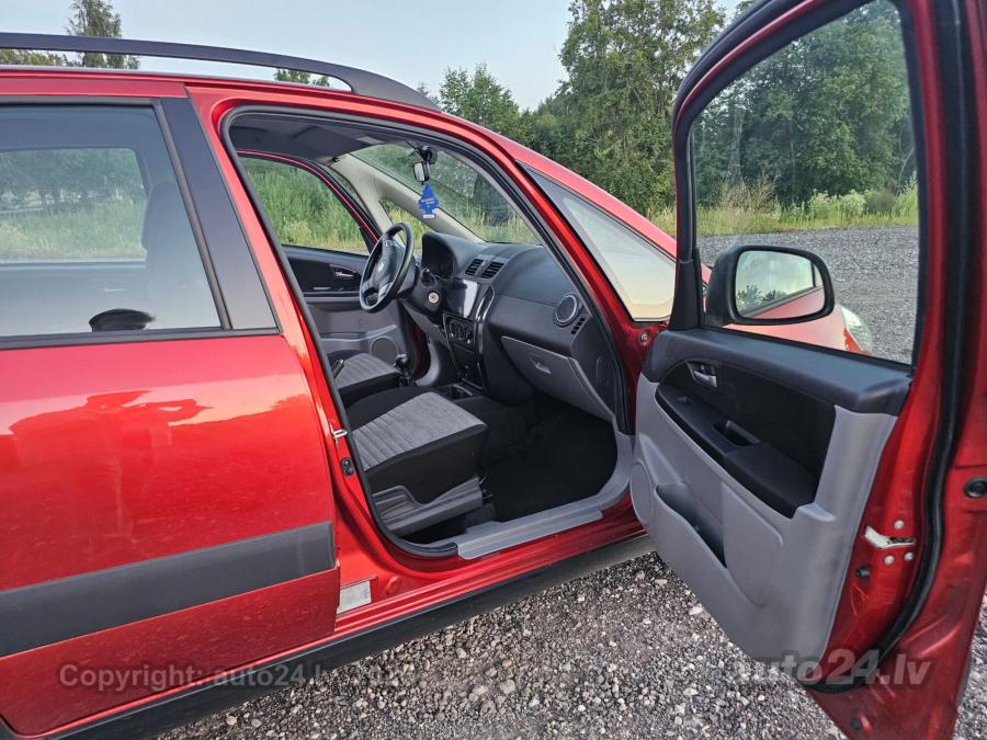 Oranžs Suzuki SX4 2011 Tallina, ar dzinēja tilpumu 1.60 L un nobraukumu 50 tūkst. km par 8500 €, foto 16 vietnē AUTOMOTO.COM.LV