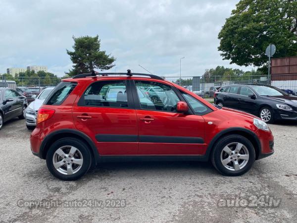 Orange Suzuki SX4 2012 in Tallinn, with an engine capacity of 1.60 L and mileage of 151 thousand km for 4950 €, photo 6 on AUTOMOTO.COM.LV