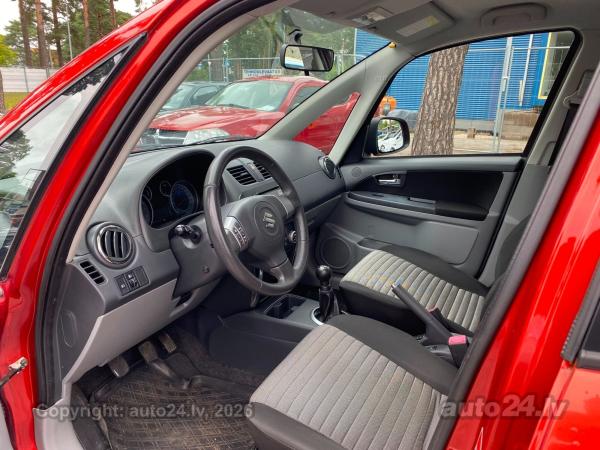 Orange Suzuki SX4 2012 in Tallinn, with an engine capacity of 1.60 L and mileage of 151 thousand km for 4950 €, photo 10 on AUTOMOTO.COM.LV