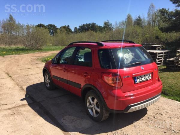 Sarkans Suzuki SX4 2008 Rīga, ar dzinēja tilpumu 1.60 L un nobraukumu 103 tūkst. km par 3500 €, foto 4 vietnē AUTOMOTO.COM.LV