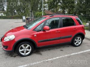 Red Suzuki SX4 2009 in Riga, with an engine capacity of 1.90 L and mileage of 215 thousand km for 4250 €, photo  on AUTOMOTO.COM.LV