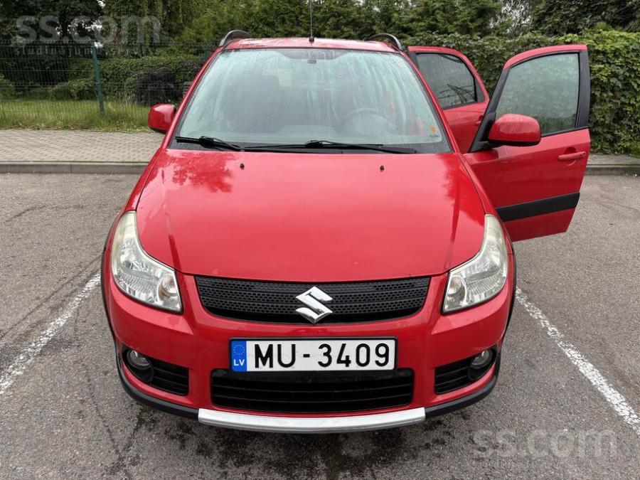 Sarkans Suzuki SX4 2009 Rīga, ar dzinēja tilpumu 1.90 L un nobraukumu 215 tūkst. km par 4250 €, foto 3 vietnē AUTOMOTO.COM.LV