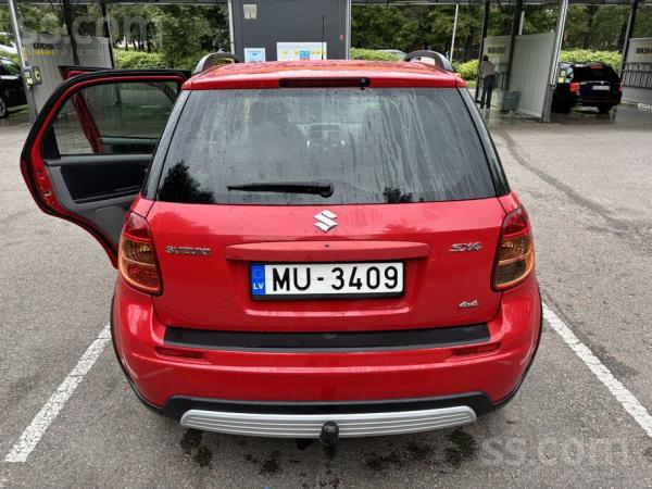 Red Suzuki SX4 2009 in Riga, with an engine capacity of 1.90 L and mileage of 215 thousand km for 4250 €, photo 5 on AUTOMOTO.COM.LV