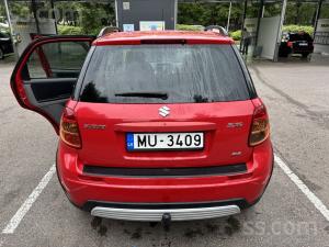 Sarkans Suzuki SX4 2009 Rīga, ar dzinēja tilpumu 1.90 L un nobraukumu 215 tūkst. km par 4250 €, foto 5 vietnē AUTOMOTO.COM.LV