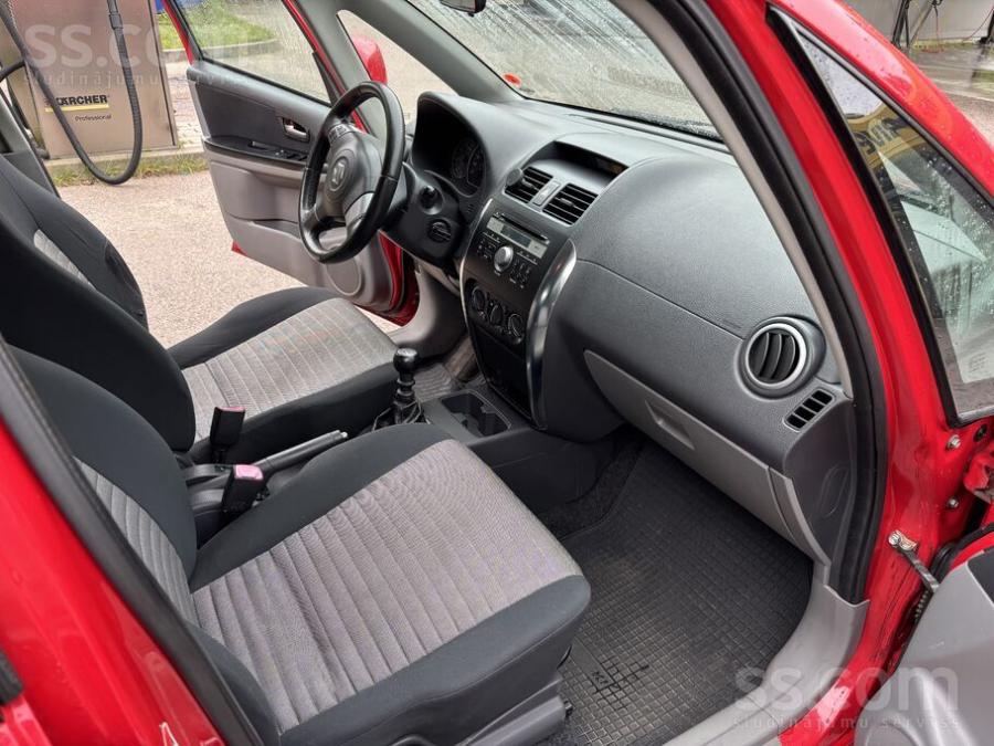 Sarkans Suzuki SX4 2009 Rīga, ar dzinēja tilpumu 1.90 L un nobraukumu 215 tūkst. km par 4250 €, foto 7 vietnē AUTOMOTO.COM.LV