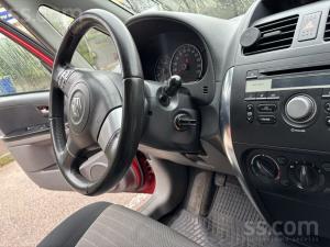 Sarkans Suzuki SX4 2009 Rīga, ar dzinēja tilpumu 1.90 L un nobraukumu 215 tūkst. km par 4250 €, foto 10 vietnē AUTOMOTO.COM.LV