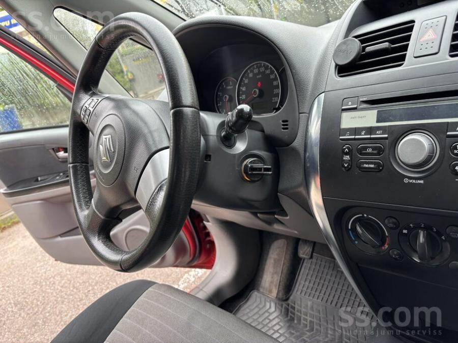 Sarkans Suzuki SX4 2009 Rīga, ar dzinēja tilpumu 1.90 L un nobraukumu 215 tūkst. km par 4250 €, foto 10 vietnē AUTOMOTO.COM.LV