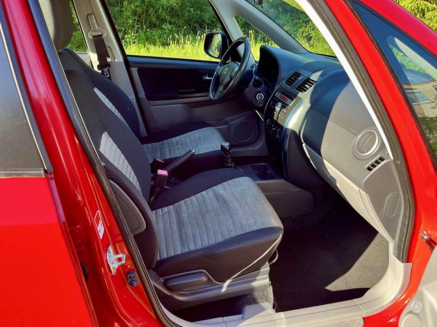 Red Suzuki SX4 2013 in Kelme, with an engine capacity of 2.00 L and mileage of 277 thousand km for 2800 €, photo 11 on AUTOMOTO.COM.LV