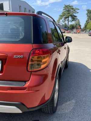 Sarkans Suzuki SX4 2006 Druskininkai, ar dzinēja tilpumu 1.87 L un nobraukumu 239 tūkst. km par 2000 €, foto 10 vietnē AUTOMOTO.COM.LV