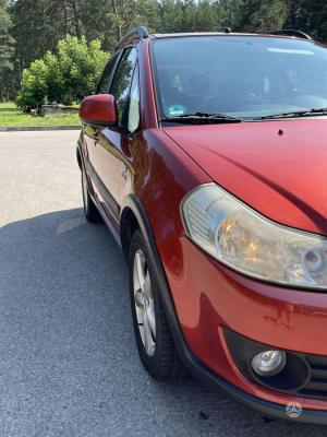 Sarkans Suzuki SX4 2006 Druskininkai, ar dzinēja tilpumu 1.87 L un nobraukumu 239 tūkst. km par 2000 €, foto 11 vietnē AUTOMOTO.COM.LV
