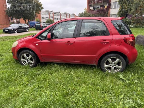 Sarkans Suzuki SX4 2006 Dobele, ar dzinēja tilpumu 1.50 L un nobraukumu 200 tūkst. km par 700 €, foto 6 vietnē AUTOMOTO.COM.LV