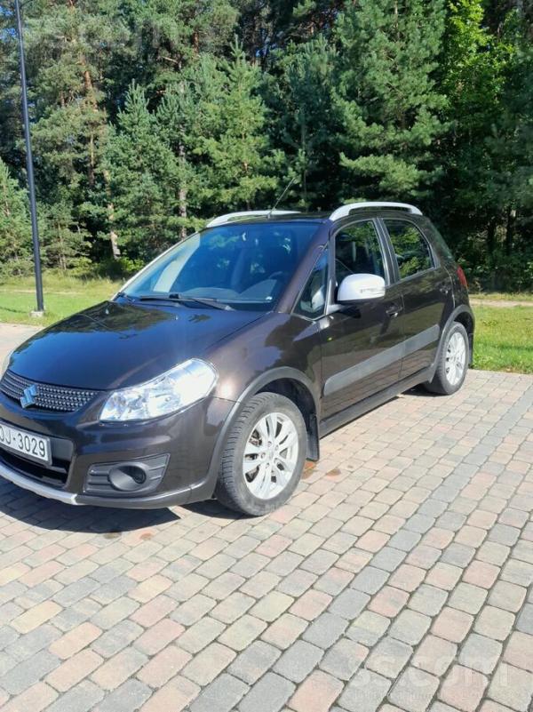 Violet Suzuki SX4 2013 in Riga, with an engine capacity of 1.60 L and mileage of 260 thousand km for 4350 €, photo 1 on AUTOMOTO.COM.LV