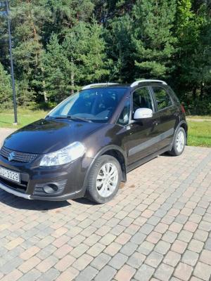 Violet Suzuki SX4 2013 in Riga, with an engine capacity of 1.60 L and mileage of 260 thousand km for 4350 €, photo  on AUTOMOTO.COM.LV
