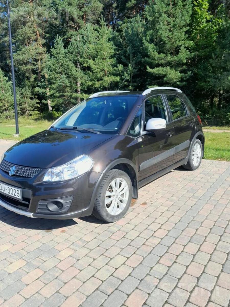 Violet Suzuki SX4 2013 in Riga, with an engine capacity of 1.60 L and mileage of 260 thousand km for 4350 €, photo 1 on AUTOMOTO.COM.LV