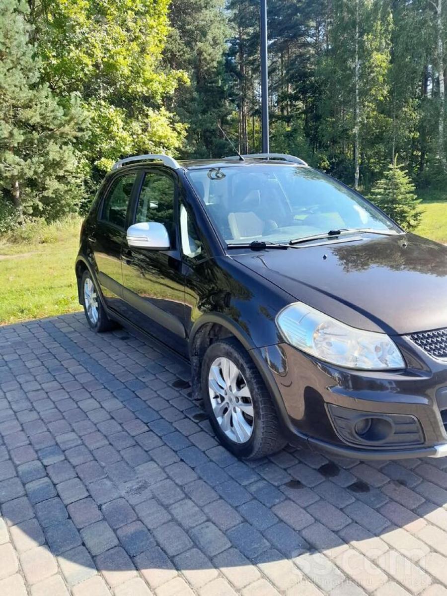 Violet Suzuki SX4 2013 in Riga, with an engine capacity of 1.60 L and mileage of 260 thousand km for 4350 €, photo 3 on AUTOMOTO.COM.LV