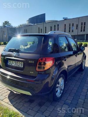 Violet Suzuki SX4 2013 in Riga, with an engine capacity of 1.60 L and mileage of 260 thousand km for 4350 €, photo 4 on AUTOMOTO.COM.LV
