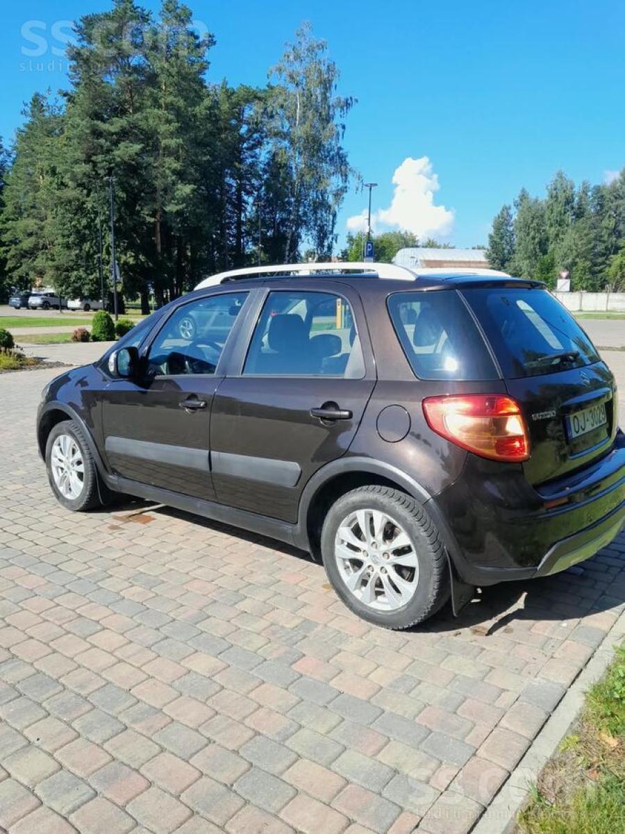 Violet Suzuki SX4 2013 in Riga, with an engine capacity of 1.60 L and mileage of 260 thousand km for 4350 €, photo 5 on AUTOMOTO.COM.LV