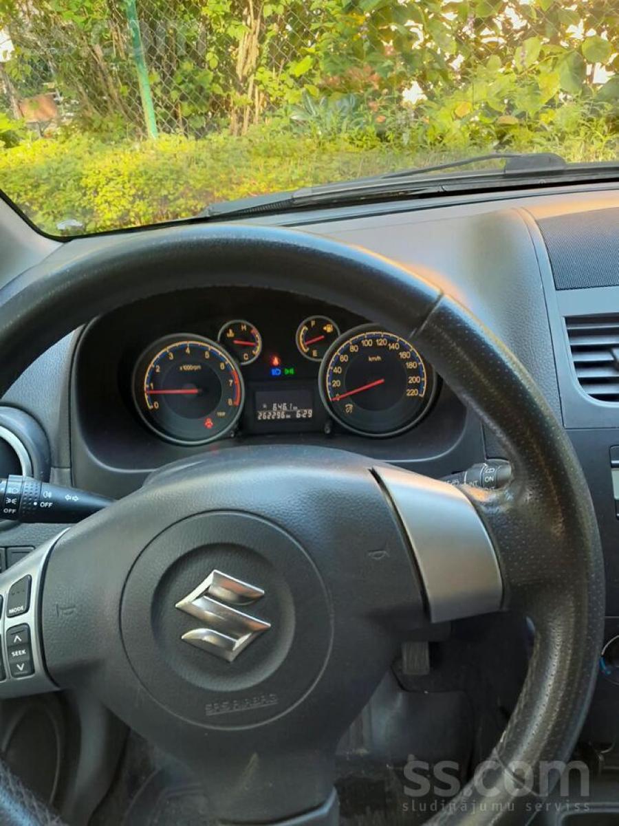 Violet Suzuki SX4 2013 in Riga, with an engine capacity of 1.60 L and mileage of 260 thousand km for 4350 €, photo 6 on AUTOMOTO.COM.LV