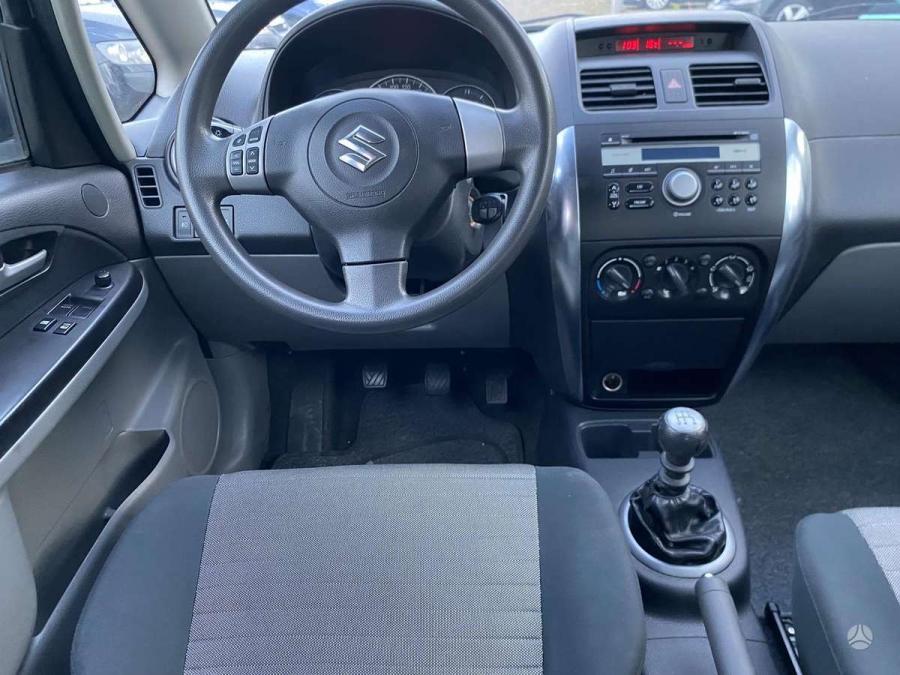 White Suzuki SX4 2009 in Birzai, with an engine capacity of 1.56 L and mileage of 259 thousand km for 2450 €, photo 9 on AUTOMOTO.COM.LV
