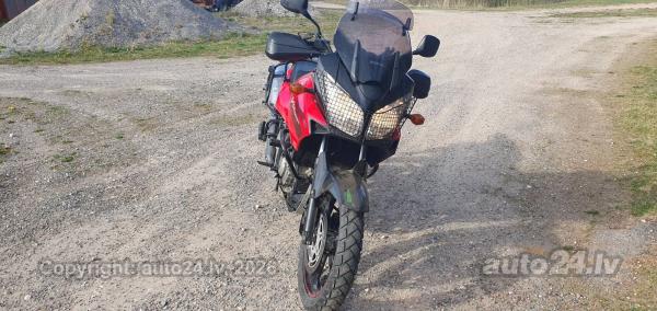 Red Suzuki V-Strom 650 2007 in Tallinn, with an engine capacity of 0.65 L and mileage of 26 thousand km for 3500 €, photo 1 on AUTOMOTO.COM.LV