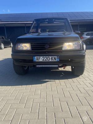 Black Suzuki Vitara 1991 in Taurage, with an engine capacity of 1.60 L and mileage of 134 thousand km for 5000 €, photo 14 on AUTOMOTO.COM.LV