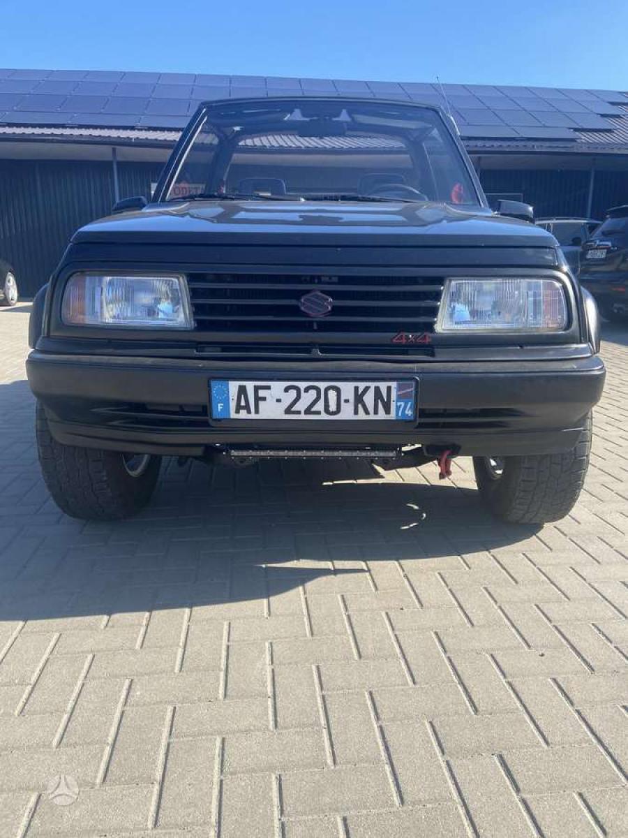 Black Suzuki Vitara 1991 in Taurage, with an engine capacity of 1.60 L and mileage of 134 thousand km for 5000 €, photo 18 on AUTOMOTO.COM.LV