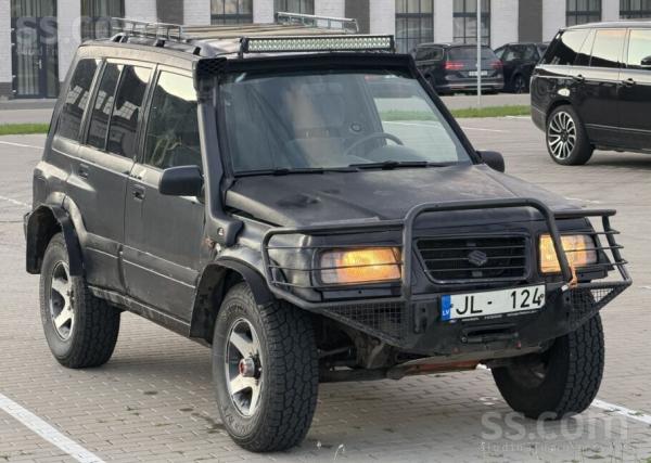 Melns Suzuki Vitara 1996 Rīga, ar dzinēja tilpumu 2.00 L un nobraukumu 295 tūkst. km par 2200 €, foto 4 vietnē AUTOMOTO.COM.LV