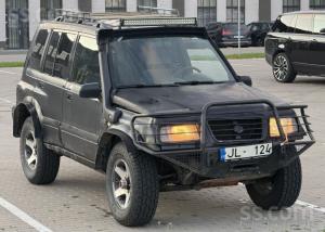 Melns Suzuki Vitara 1996 Rīga, ar dzinēja tilpumu 2.00 L un nobraukumu 295 tūkst. km par 2200 €, foto 5 vietnē AUTOMOTO.COM.LV