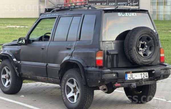 Melns Suzuki Vitara 1996 Rīga, ar dzinēja tilpumu 2.00 L un nobraukumu 295 tūkst. km par 2200 €, foto 7 vietnē AUTOMOTO.COM.LV
