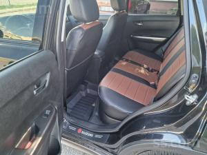 Black Suzuki Vitara 2023 in Riga, with an engine capacity of 1.40 L and mileage of 16 thousand km for 19990 €, photo 11 on AUTOMOTO.COM.LV
