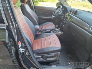 Black Suzuki Vitara 2023 in Riga, with an engine capacity of 1.40 L and mileage of 16 thousand km for 19990 €, photo 12 on AUTOMOTO.COM.LV