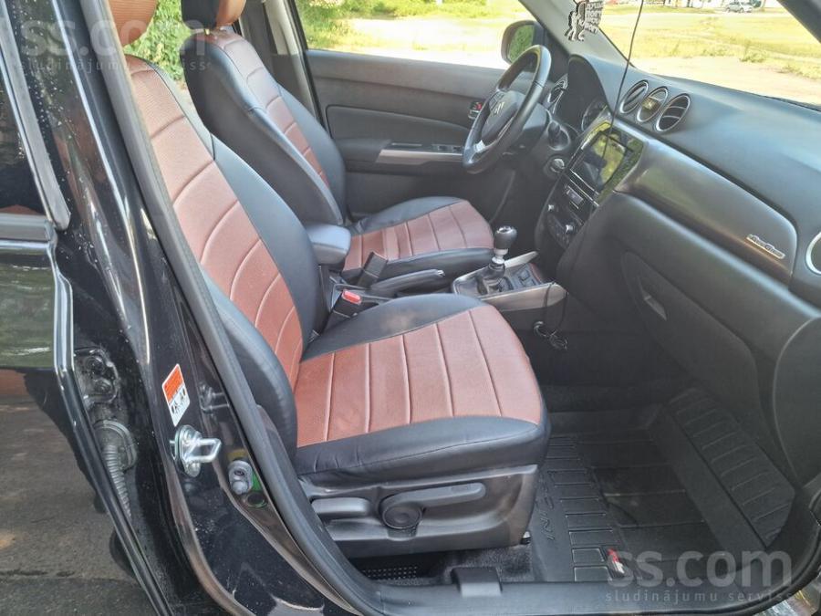Black Suzuki Vitara 2023 in Riga, with an engine capacity of 1.40 L and mileage of 16 thousand km for 19990 €, photo 12 on AUTOMOTO.COM.LV