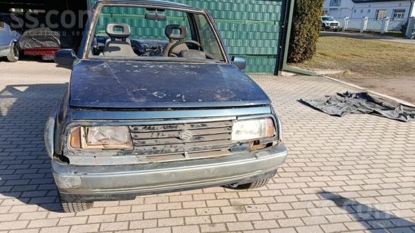 Blue Suzuki Vitara 1989 in Riga, with an engine capacity of 1.60 L and mileage of 100 thousand km for 500 €, photo 2 on AUTOMOTO.COM.LV