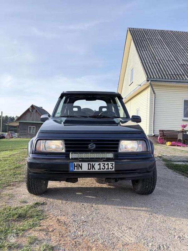 Blue Suzuki Vitara 1995 in Vilnius, with an engine capacity of 1.60 L and mileage of 292 thousand km for 4999 €, photo 6 on AUTOMOTO.COM.LV