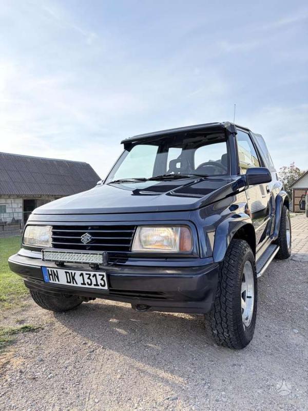 Blue Suzuki Vitara 1995 in Vilnius, with an engine capacity of 1.60 L and mileage of 292 thousand km for 4999 €, photo 9 on AUTOMOTO.COM.LV