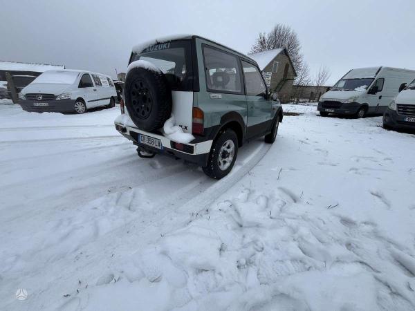 Green Suzuki Vitara 1991 in Taurage, with an engine capacity of 1.59 L and mileage of 222 thousand km for 2000 €, photo 7 on AUTOMOTO.COM.LV