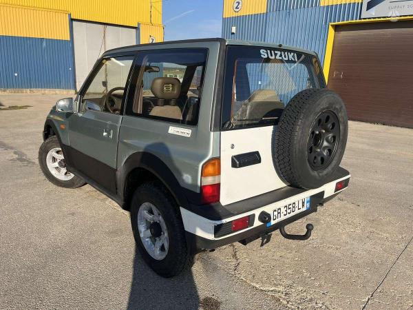 Green Suzuki Vitara 1991 in Taurage, with an engine capacity of 1.59 L and mileage of 235 thousand km for 1999 €, photo 6 on AUTOMOTO.COM.LV