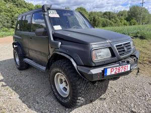 Green Suzuki Vitara 1995 in Kaunas, with an engine capacity of 2.00 L and mileage of 215 thousand km for 4550 €, photo 3 on AUTOMOTO.COM.LV