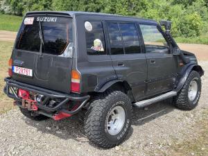 Green Suzuki Vitara 1995 in Kaunas, with an engine capacity of 2.00 L and mileage of 215 thousand km for 4550 €, photo 7 on AUTOMOTO.COM.LV