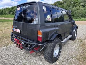 Green Suzuki Vitara 1995 in Kaunas, with an engine capacity of 2.00 L and mileage of 215 thousand km for 4550 €, photo 8 on AUTOMOTO.COM.LV