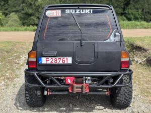 Green Suzuki Vitara 1995 in Kaunas, with an engine capacity of 2.00 L and mileage of 215 thousand km for 4550 €, photo 9 on AUTOMOTO.COM.LV