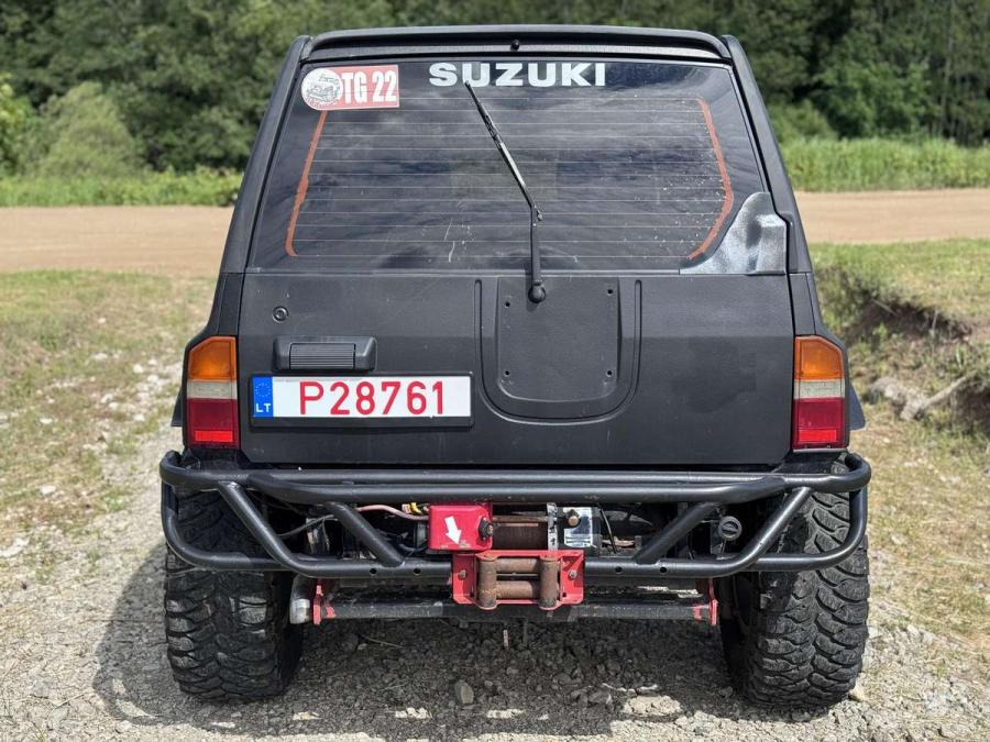 Green Suzuki Vitara 1995 in Kaunas, with an engine capacity of 2.00 L and mileage of 215 thousand km for 4550 €, photo 9 on AUTOMOTO.COM.LV