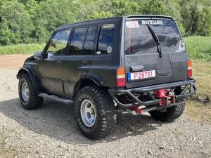 Green Suzuki Vitara 1995 in Kaunas, with an engine capacity of 2.00 L and mileage of 215 thousand km for 4550 €, photo 11 on AUTOMOTO.COM.LV