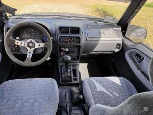 Green Suzuki Vitara 1995 in Kaunas, with an engine capacity of 2.00 L and mileage of 215 thousand km for 4550 €, photo 13 on AUTOMOTO.COM.LV