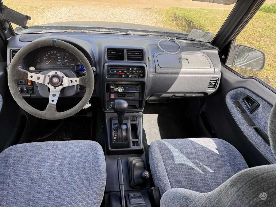 Green Suzuki Vitara 1995 in Kaunas, with an engine capacity of 2.00 L and mileage of 215 thousand km for 4550 €, photo 13 on AUTOMOTO.COM.LV